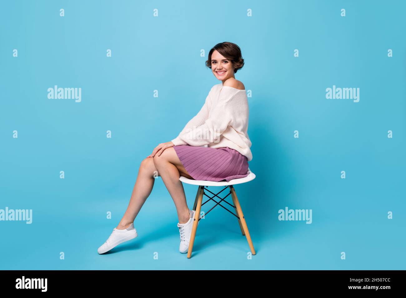 Woman sitting chair side view isolated hi-res stock photography and ...