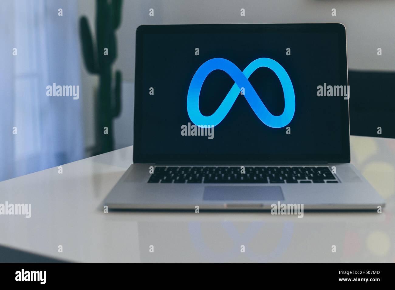 Laptop with Meta logo on display. New Mark Zuckerberg social. Computer ...