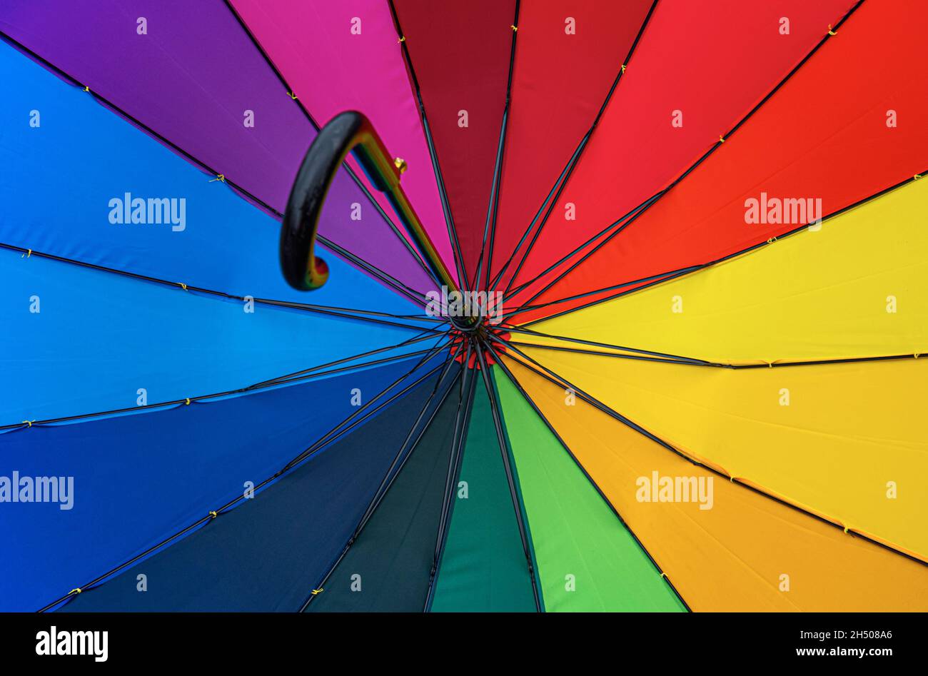 Multi-colored umbrella. Inside view Stock Photo - Alamy