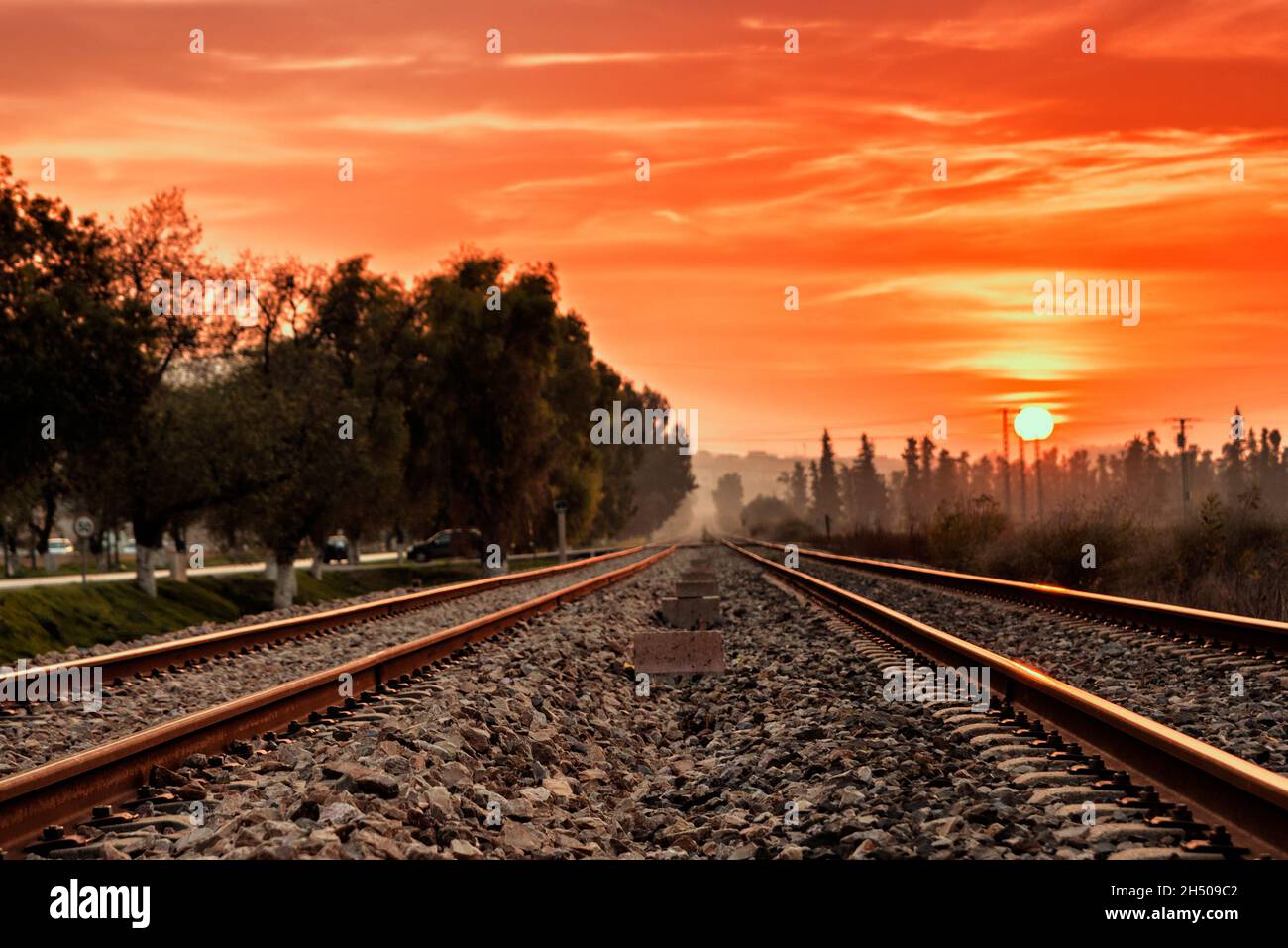 railway in the sunset Stock Photo - Alamy