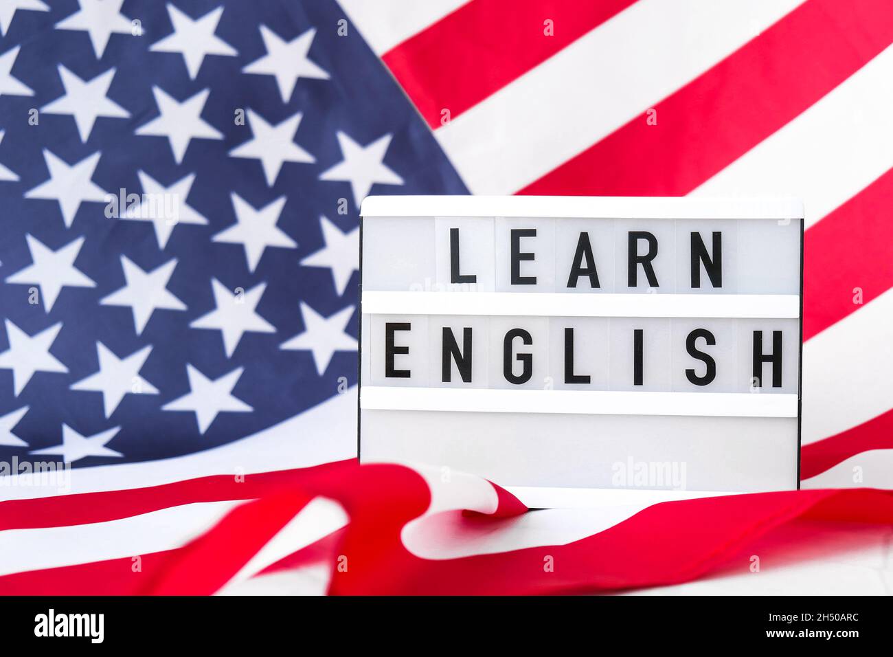 American flag. Lightbox with text LEARN ENGLISH Flag of the united ...