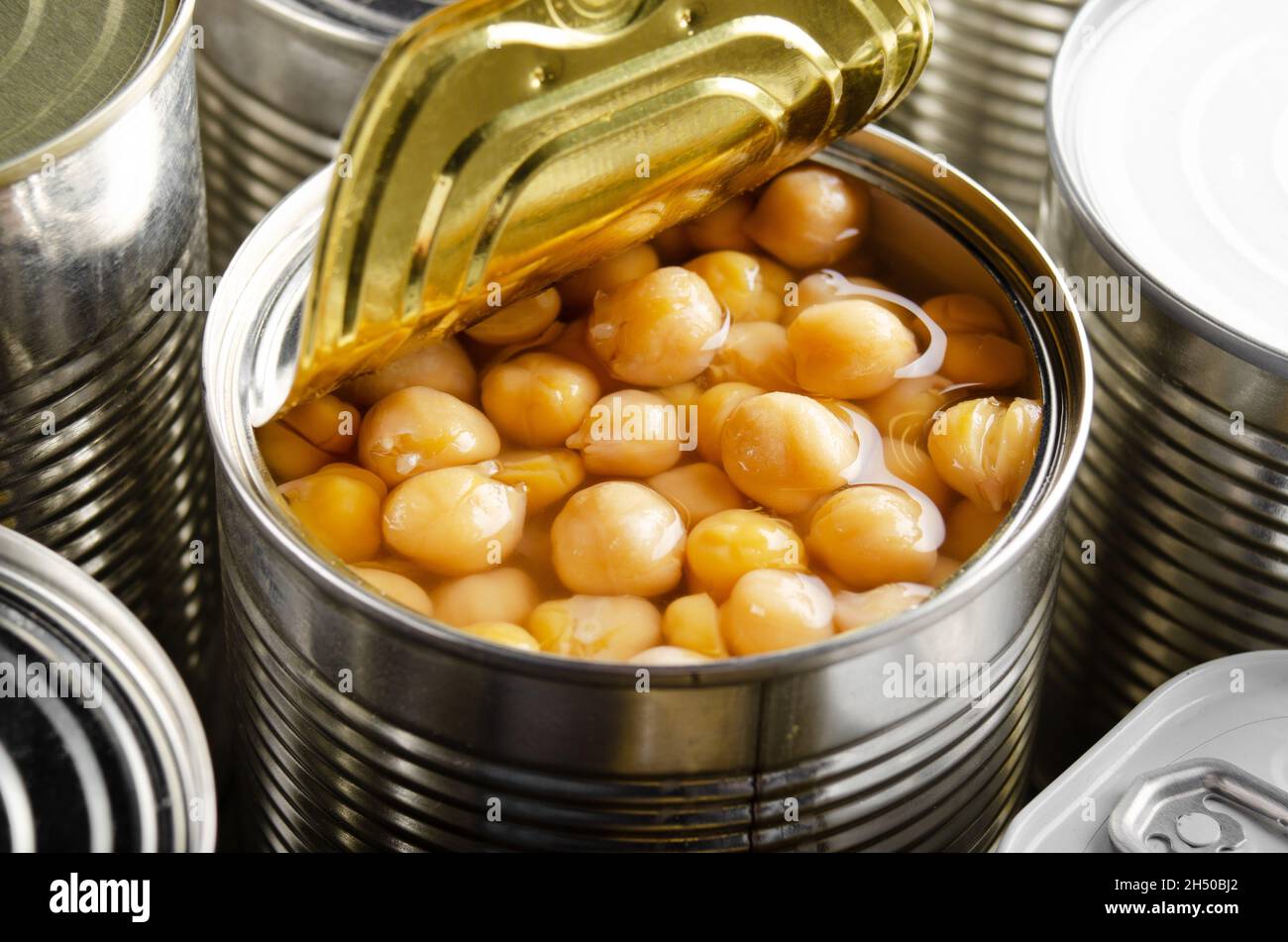 Canned chickpeas in just opened tin can. Non-perishable food Stock ...