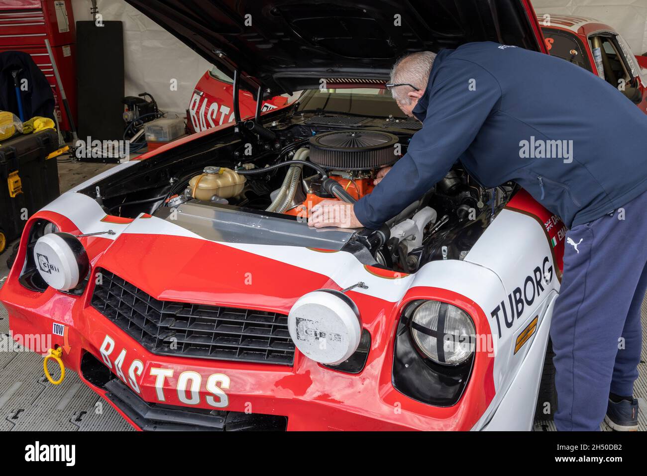 Mechanic at work on the 1979 Bastos Chevrolet Camaro Z28 in the garage ...