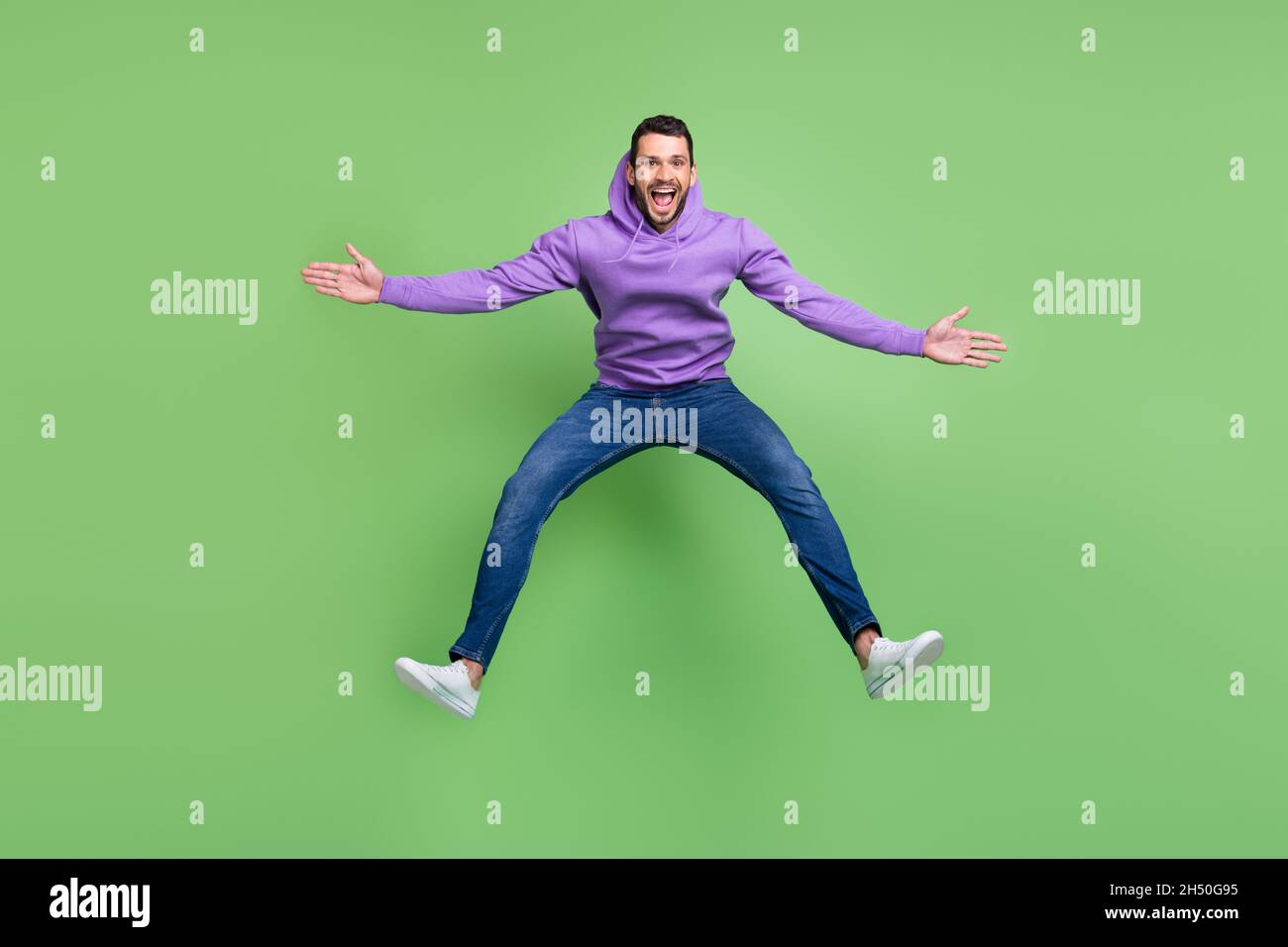 Full length photo of young excited man happy positive smile jump up ...
