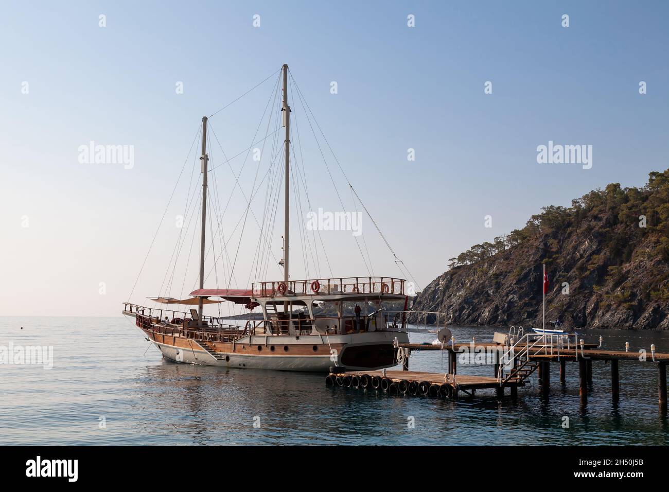 Vintage mast wooden sailing ship for sea tours. Touristic pirate ship ...