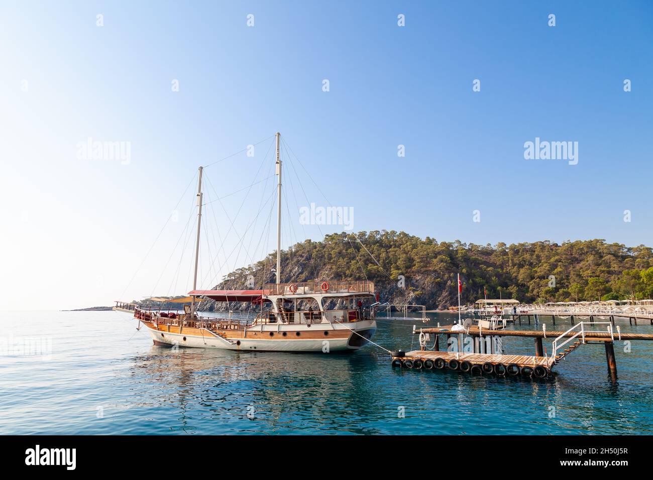 Vintage mast wooden sailing ship for sea tours. Touristic pirate ship ...