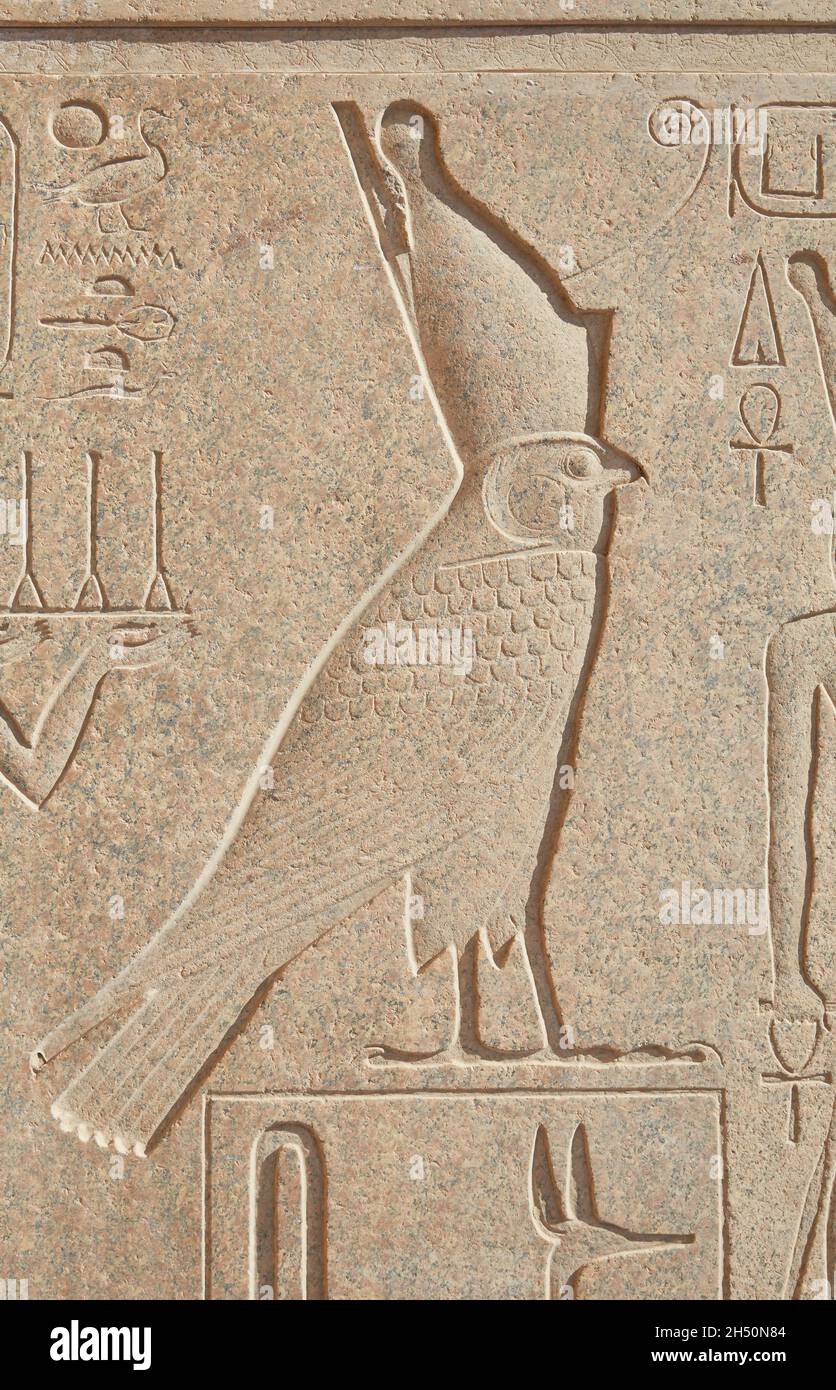 An intricate carving of Horus on the side of an obelisk at Karnak ...