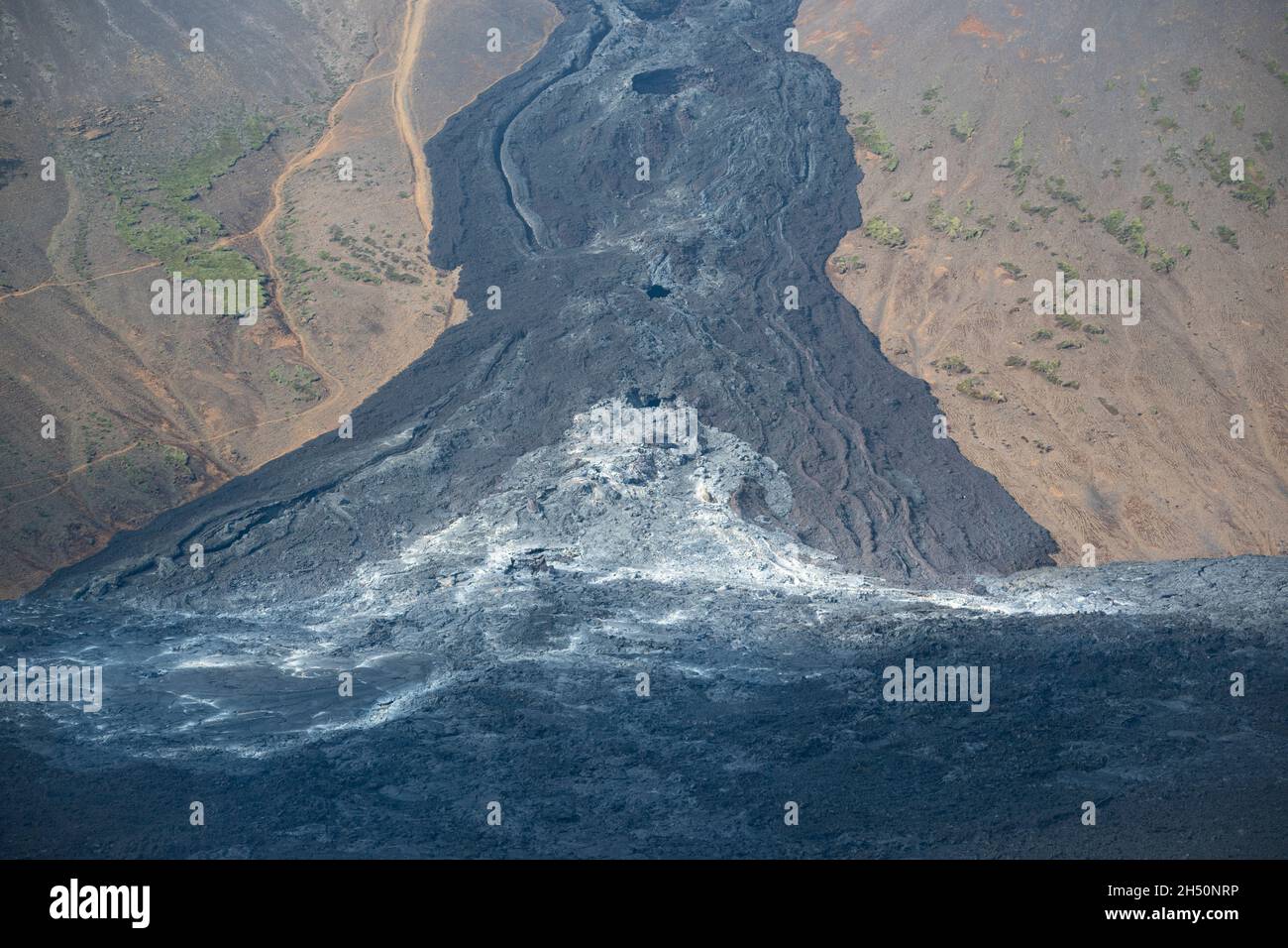 Landscape of vast black molten lava rock at Fagradalsfjall Volcano ...