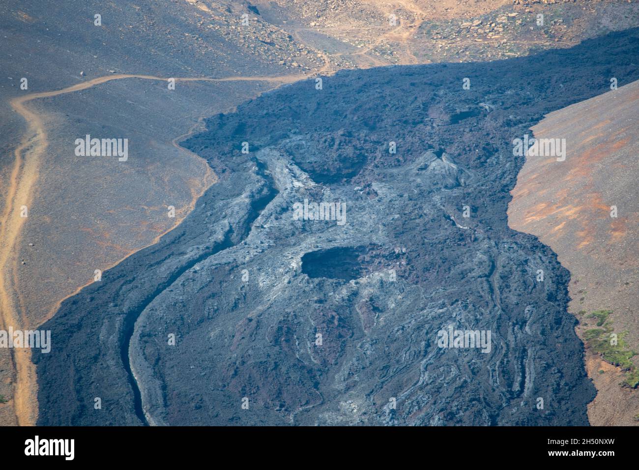 Landscape of vast black molten lava rock at Fagradalsfjall Volcano ...