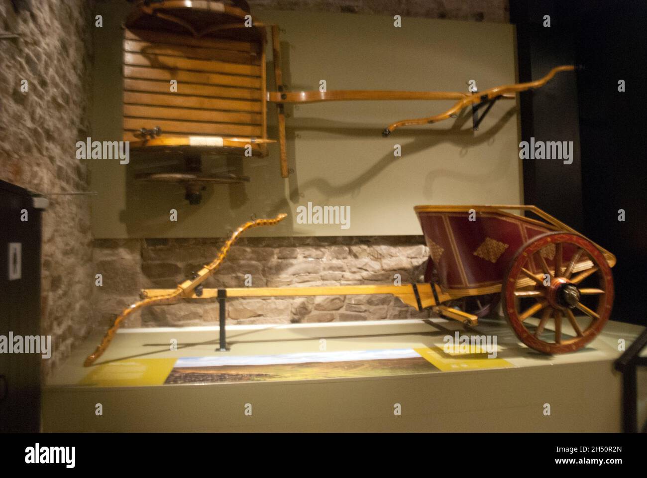 A recreated Celtic chariot and below it a Roman Chariot at the Roman ...