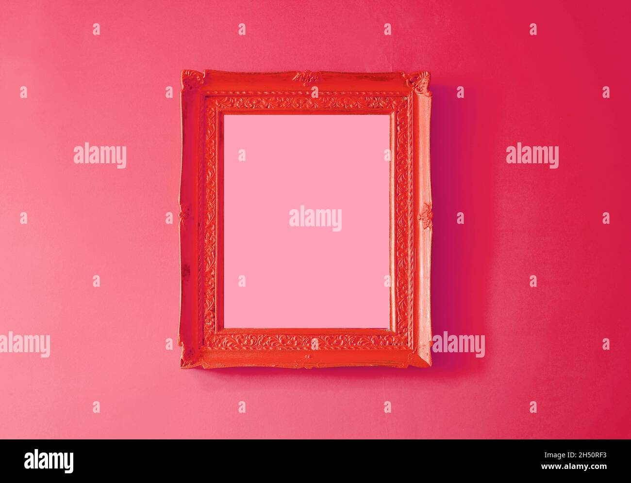Scarlet red antique empty photo frame isolated on gradient raspberry ...