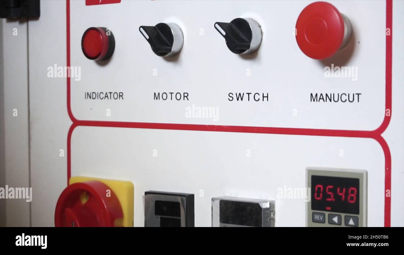 Close-up of white plant equipment control switch panel. Modern ...