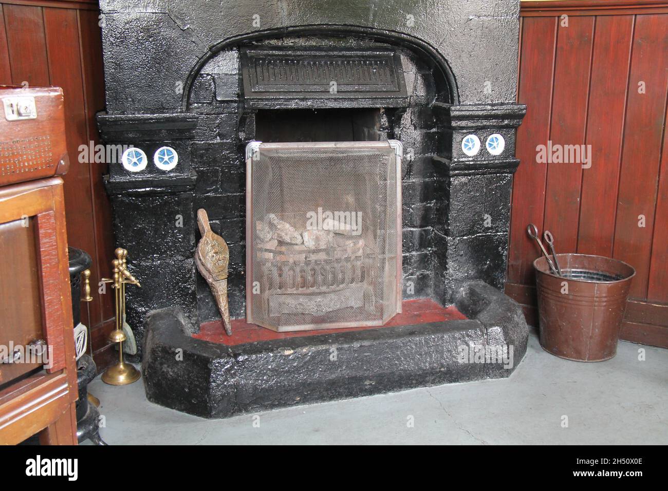 A Traditional Open Coal Fireplace with a Fire Guard Stock Photo - Alamy