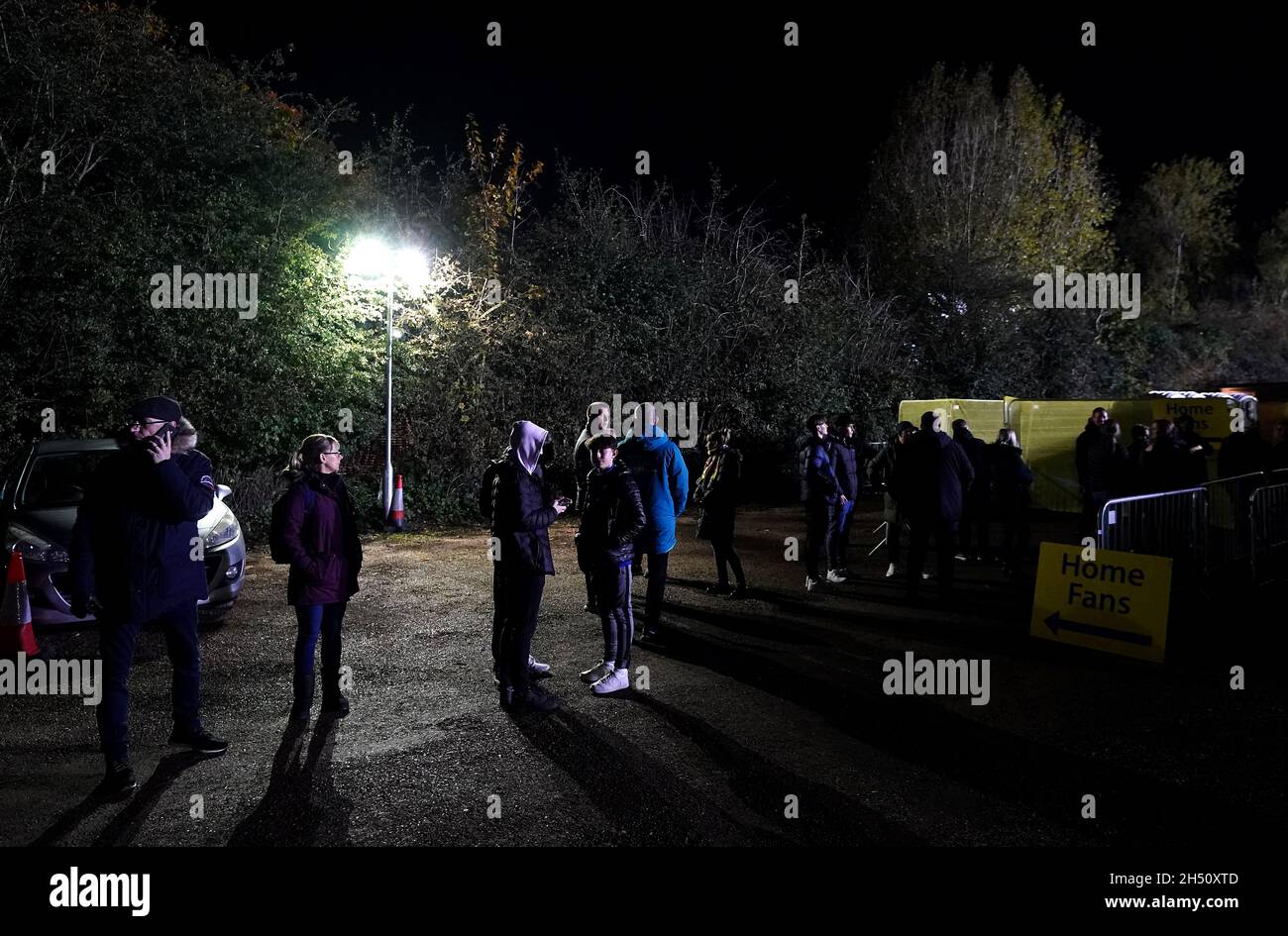 AFC Sudbury fans make their way to the stadium before the Emirates FA ...