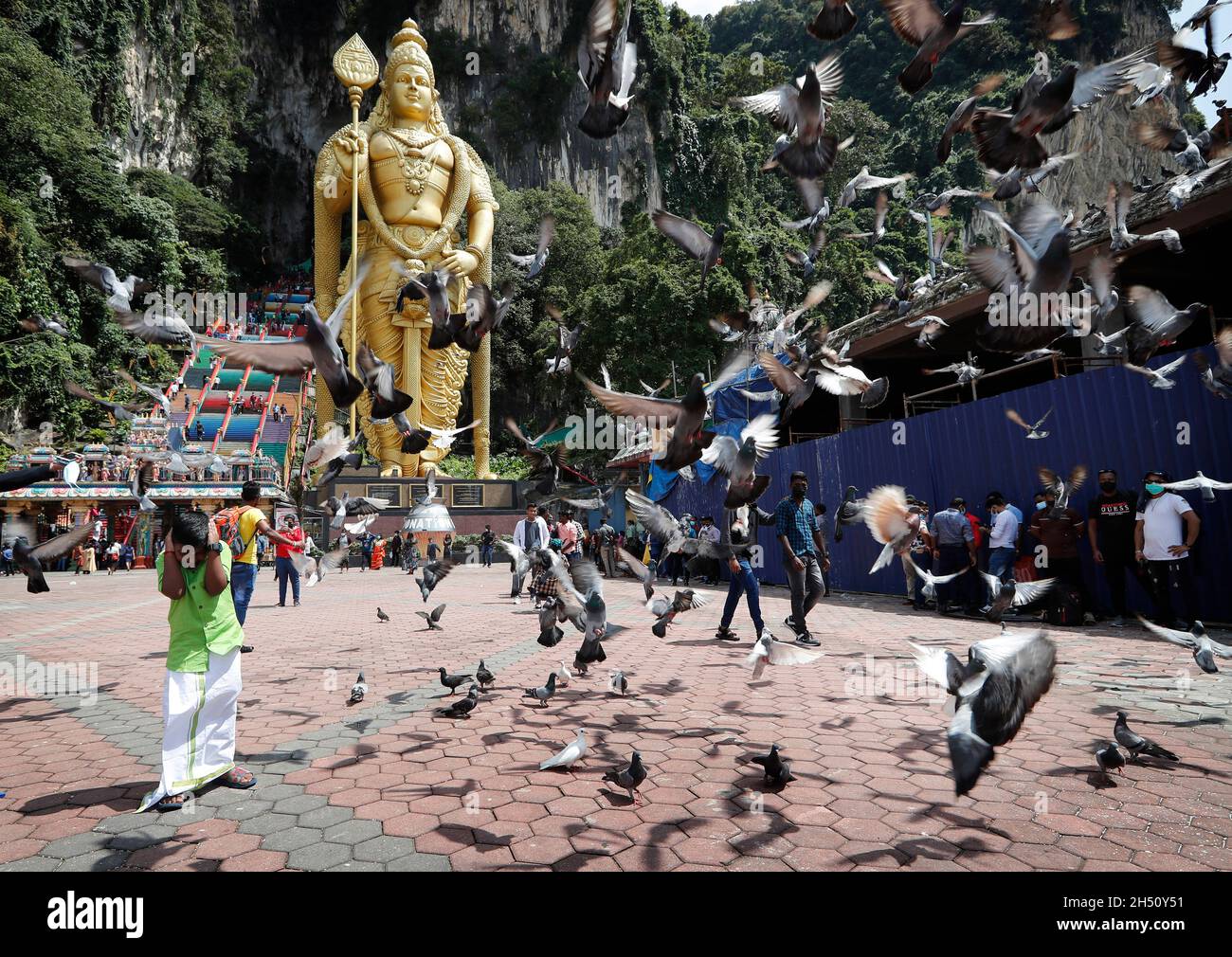 Kuala Lumpur, Malaysia. 04th Nov, 2021. A Hindu boy reacts while ...