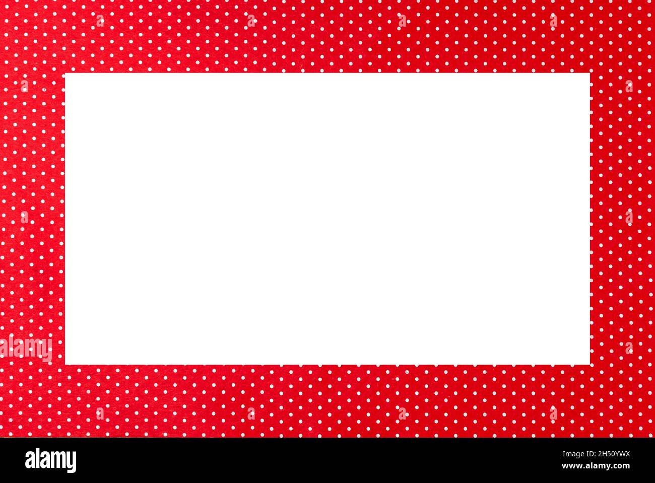 Frame of red felt cloth in small white peas and with a white middle ...