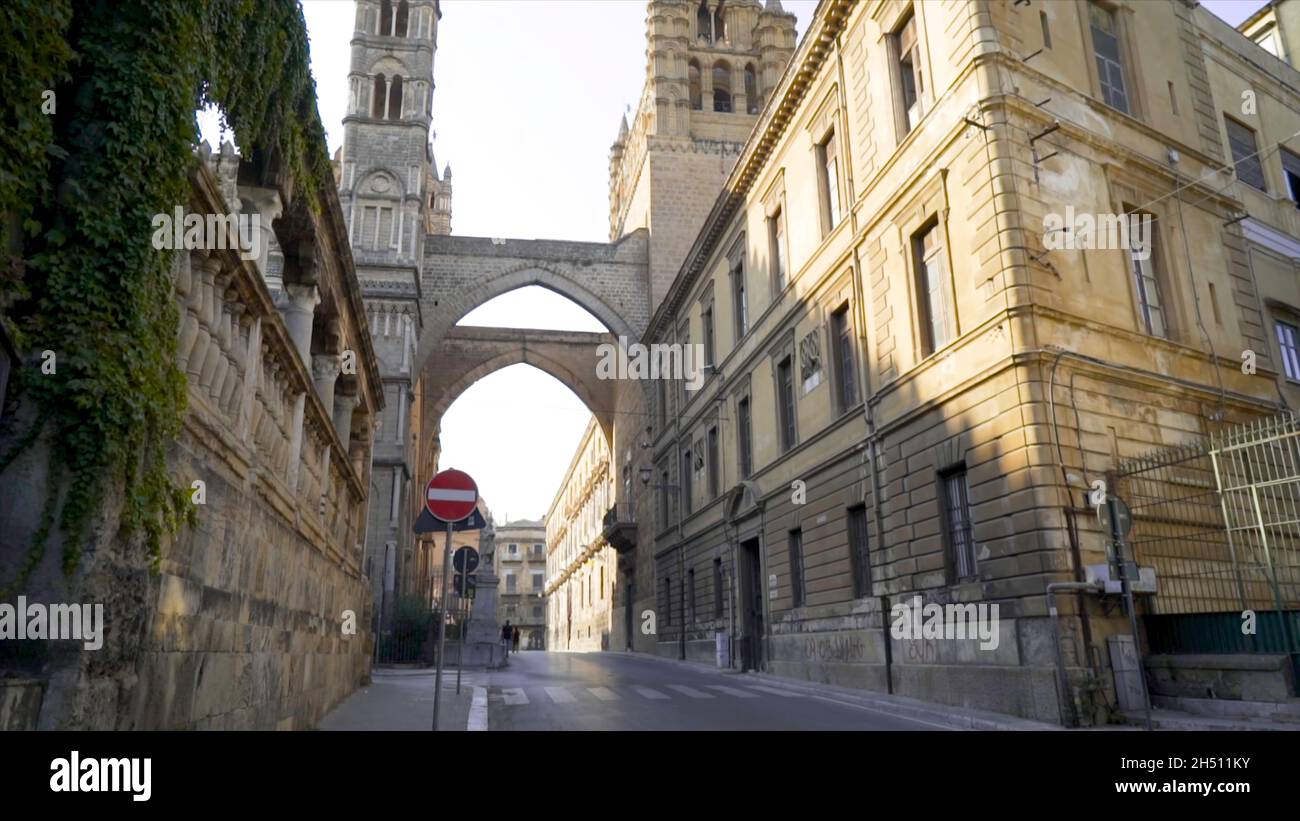 Street under two towers of Cathedral. Action. Beautiful European street ...