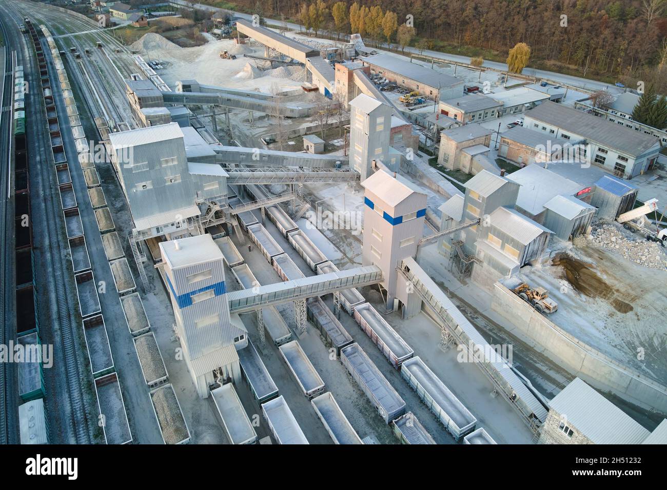 Aerial view of cargo train loaded with crushed stone materials at ...