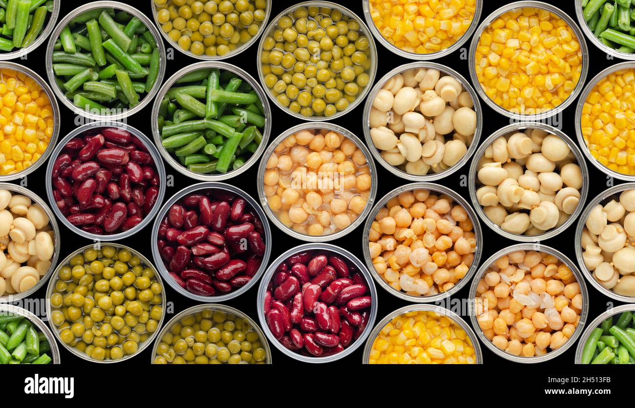 Isolated on black canned food seamless background made of opened cans ...