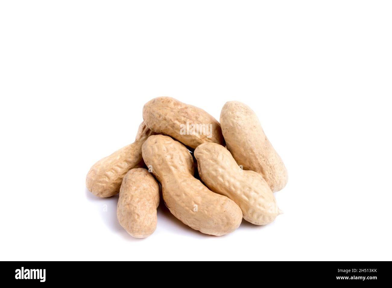 Peeled peanuts and peanut pod isolated on white background Stock Photo ...