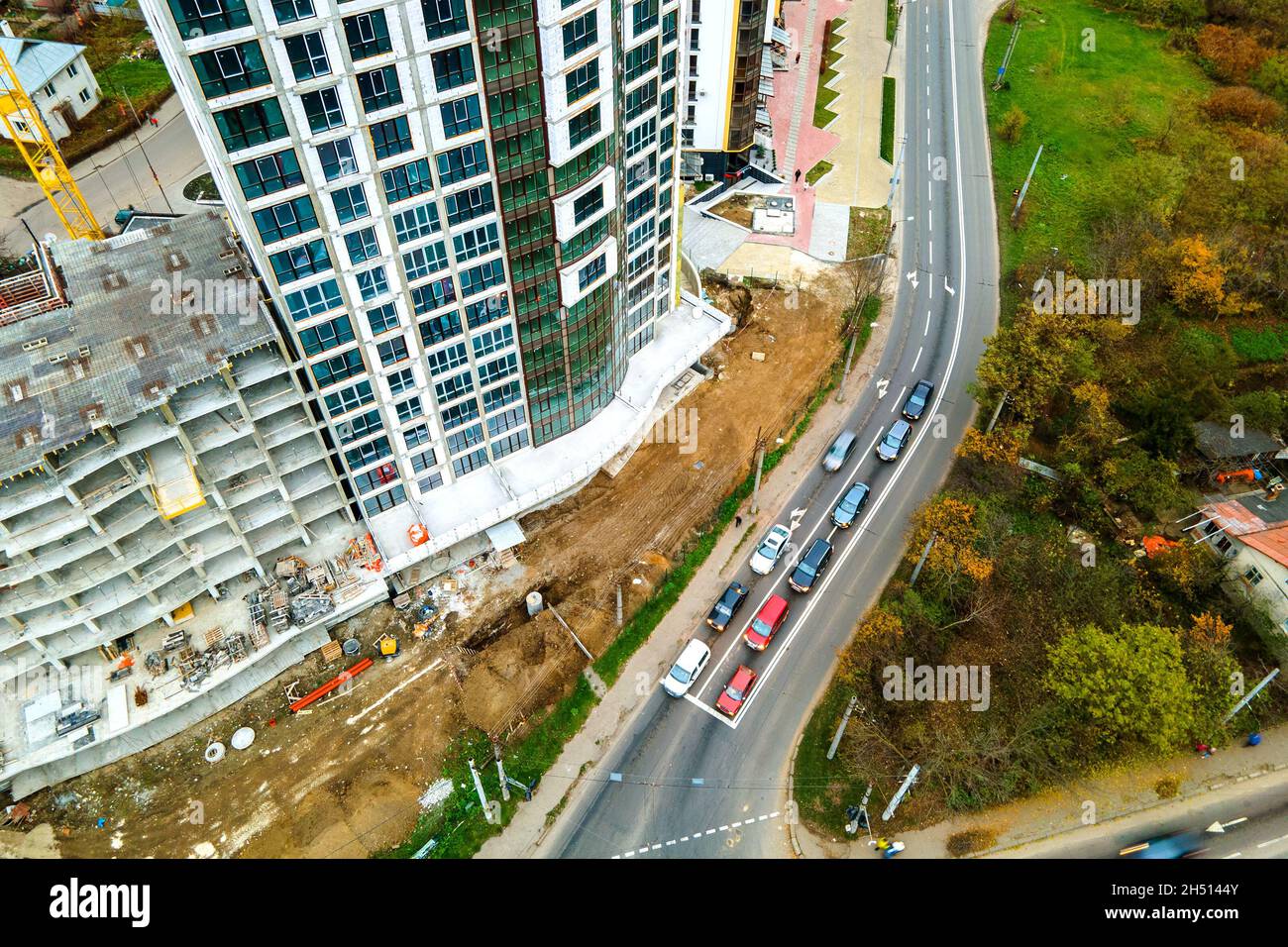 High rise apartment buildings and streets with traffic in city ...