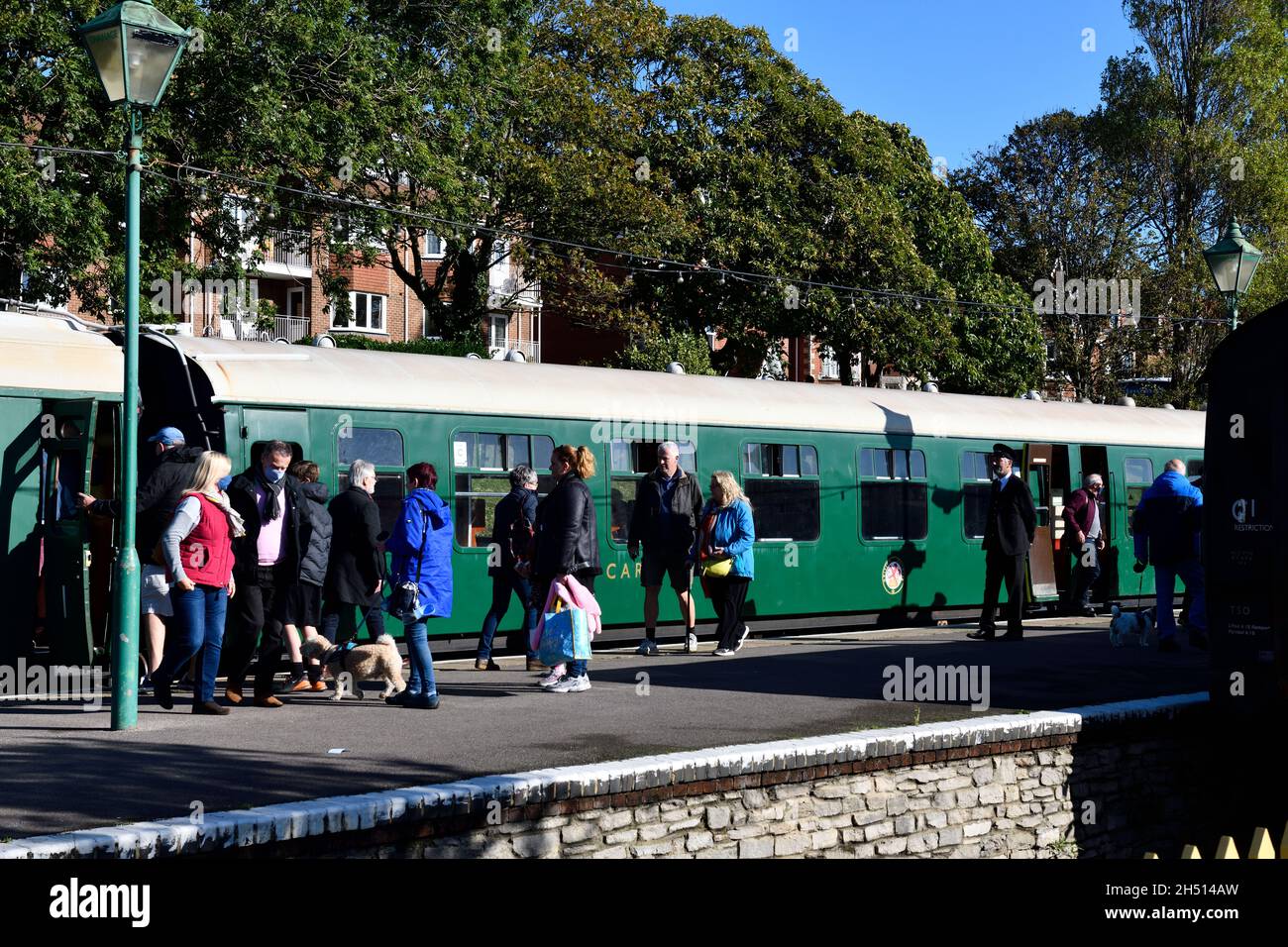 Passengers boarding and unloading on the Swanage Platform with the ...