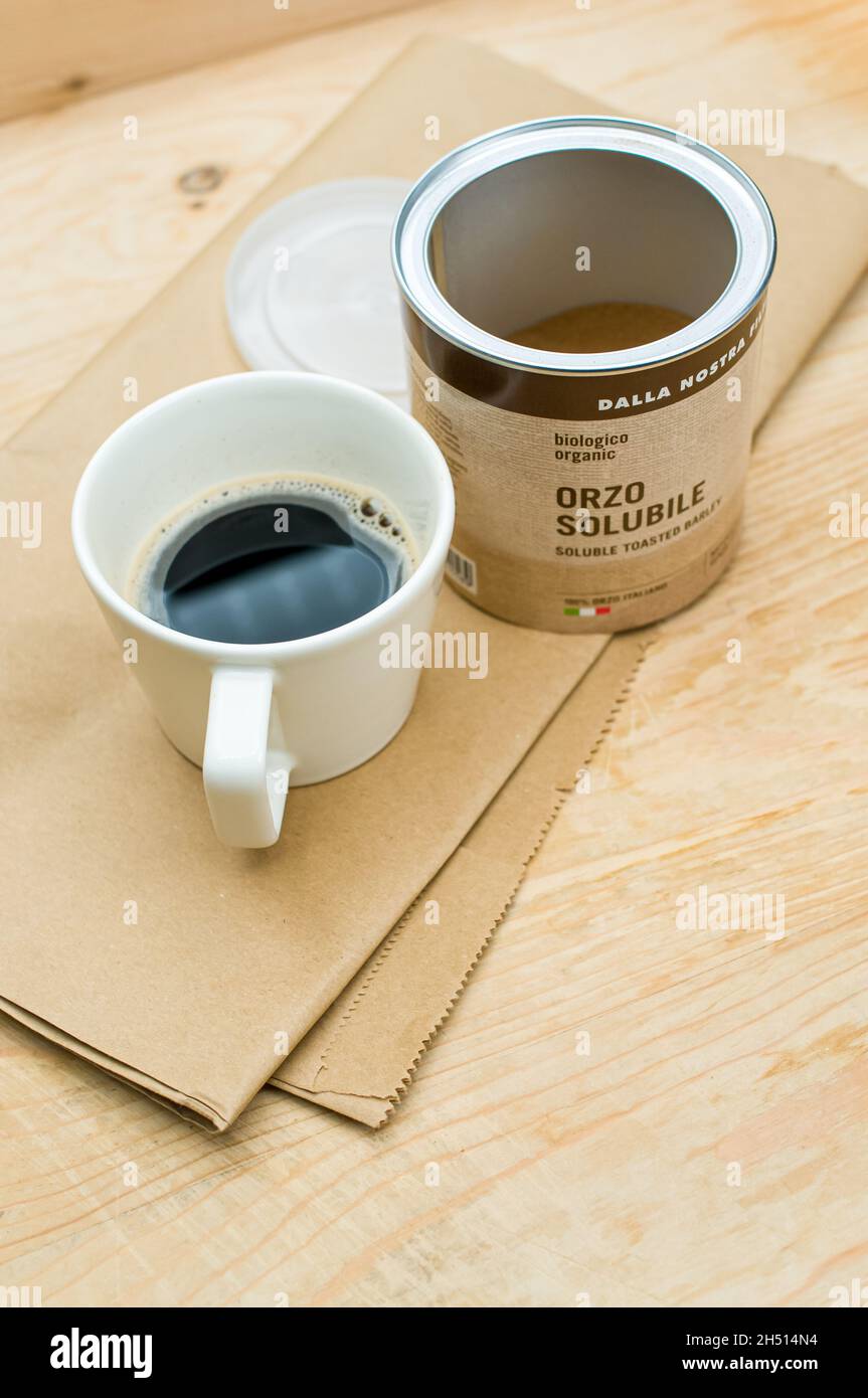 COMO, ITALY - Nov 04, 2021: cup of barley coffee and can of toasted ...