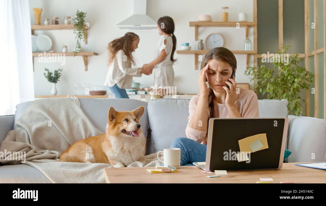 A Busy Mother Trying to Work Remotely With Her Children's at Home ...