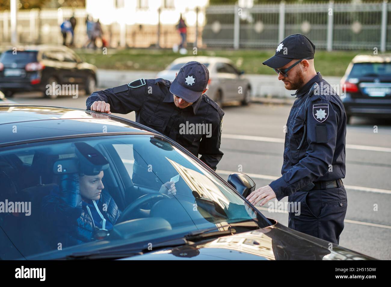 Female security guard checking hi-res stock photography and images - Alamy
