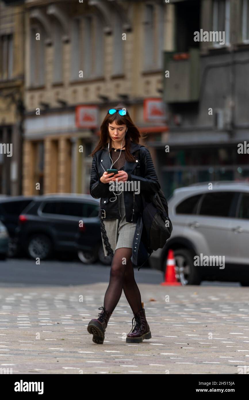 Timisoara, Romania - October 06, 2021: Woman walking on the street ...