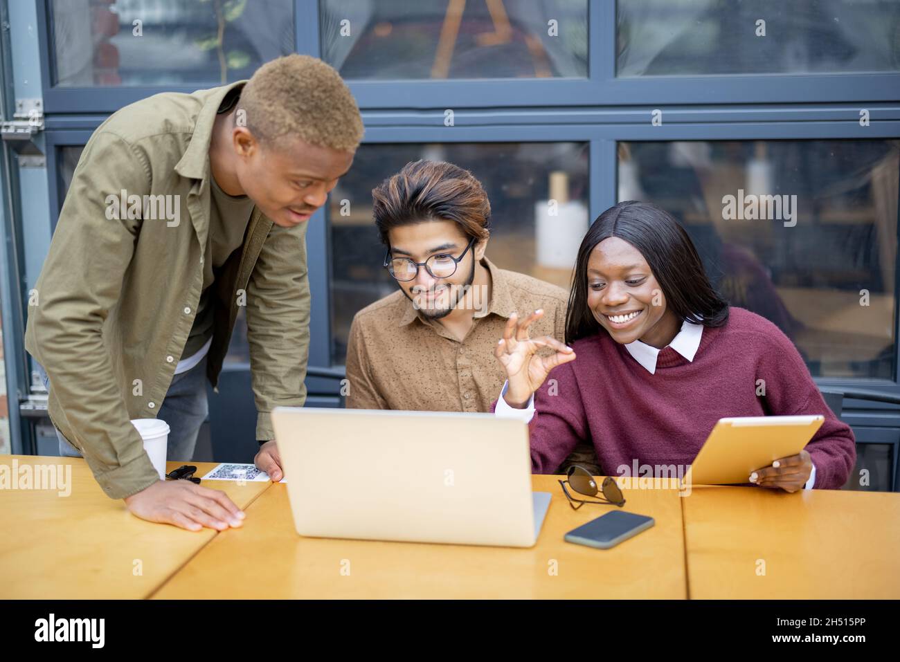 Multiracial students having video call on laptop Stock Photo - Alamy