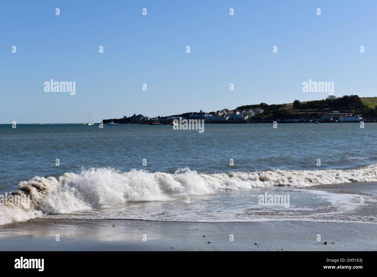 Waves breaking at Swanage Bay Dorset England uk Stock Photo - Alamy