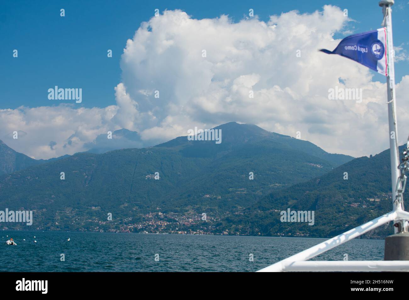 Stunning Panorama of Lake Como, Italy from a water ferry. Flag with ...