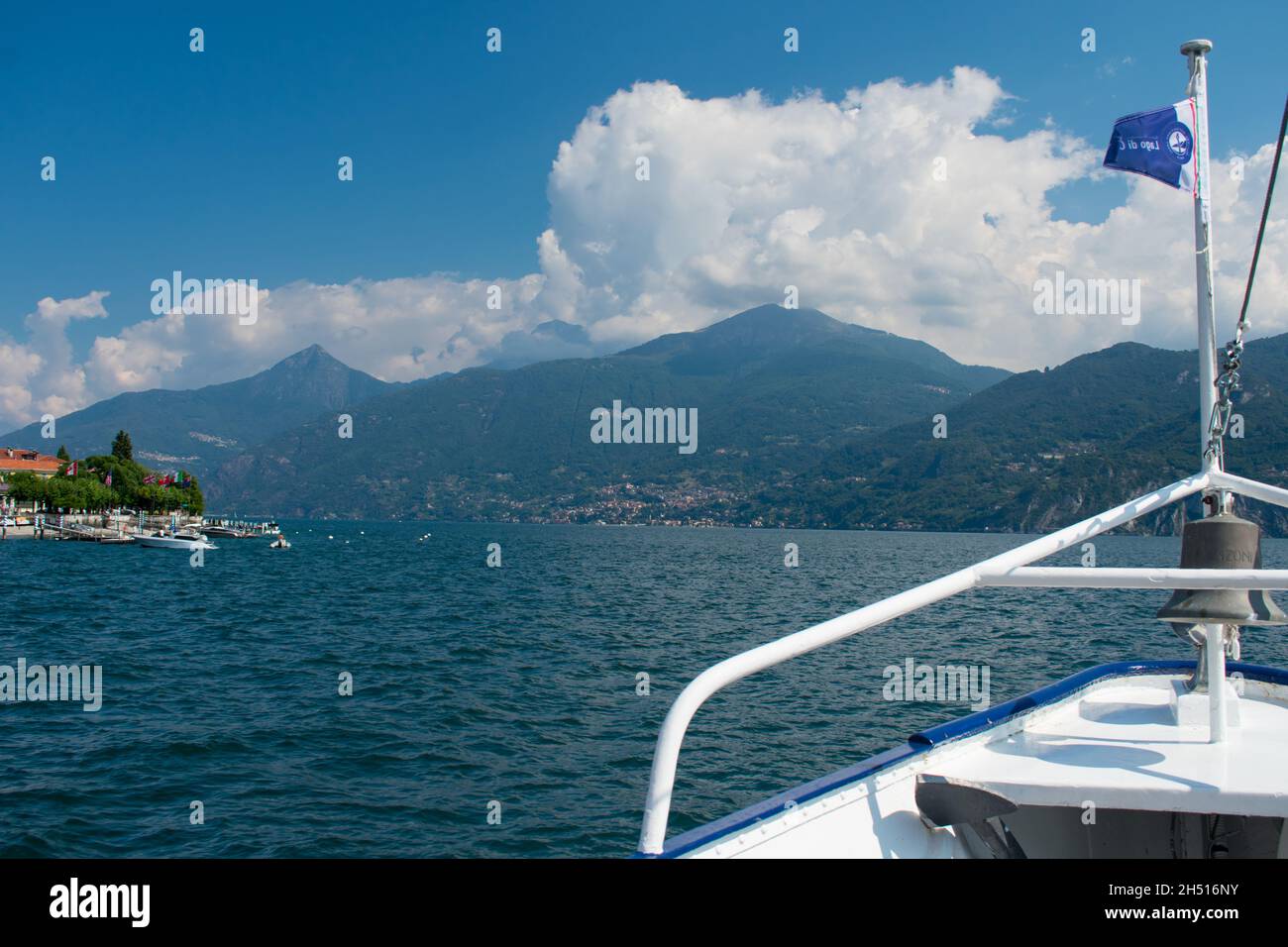 Stunning Panorama of Lake Como, Italy from a water ferry. Flag with ...