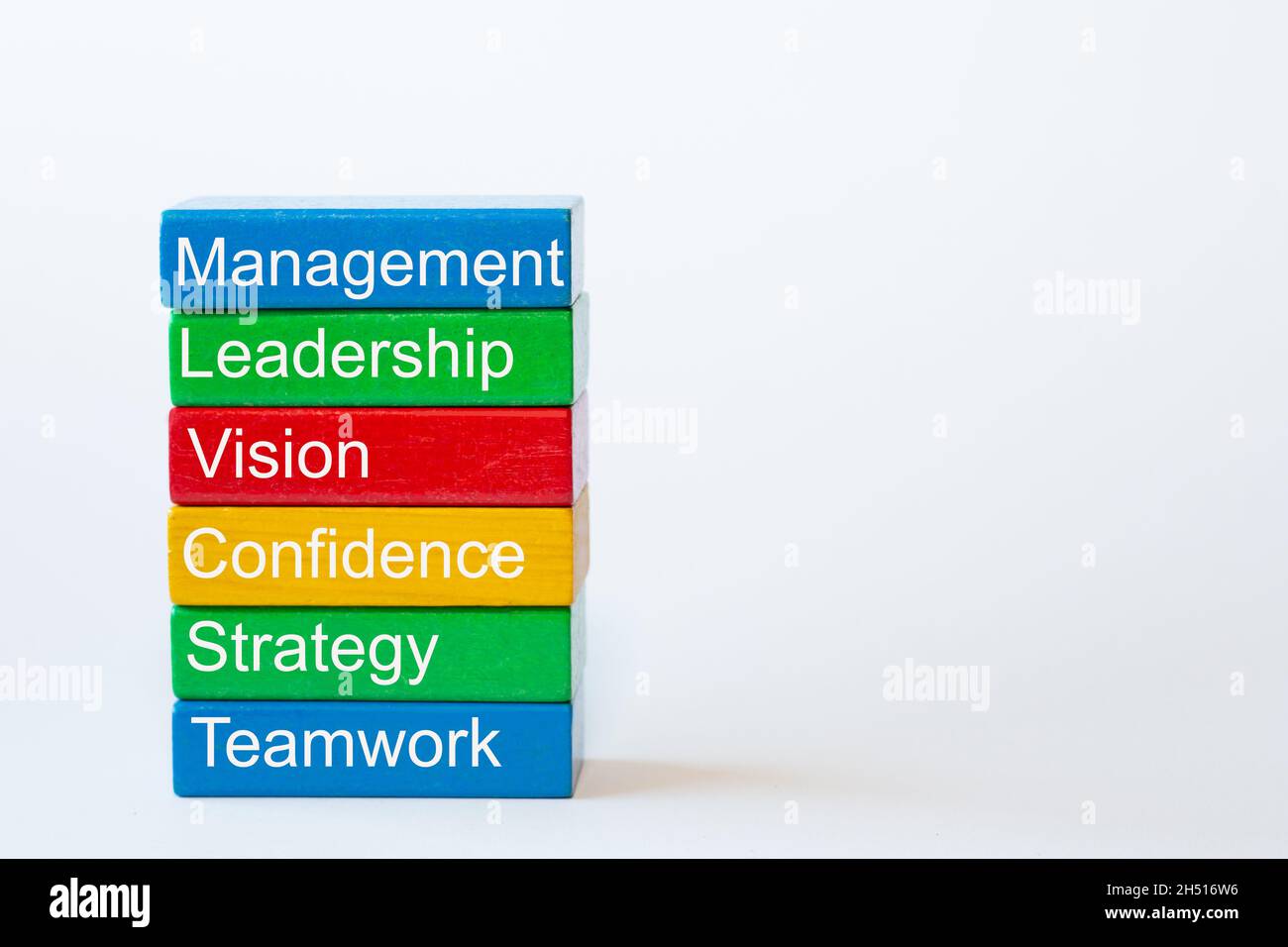 colorful blocks with the words: management, leadership, vision ...