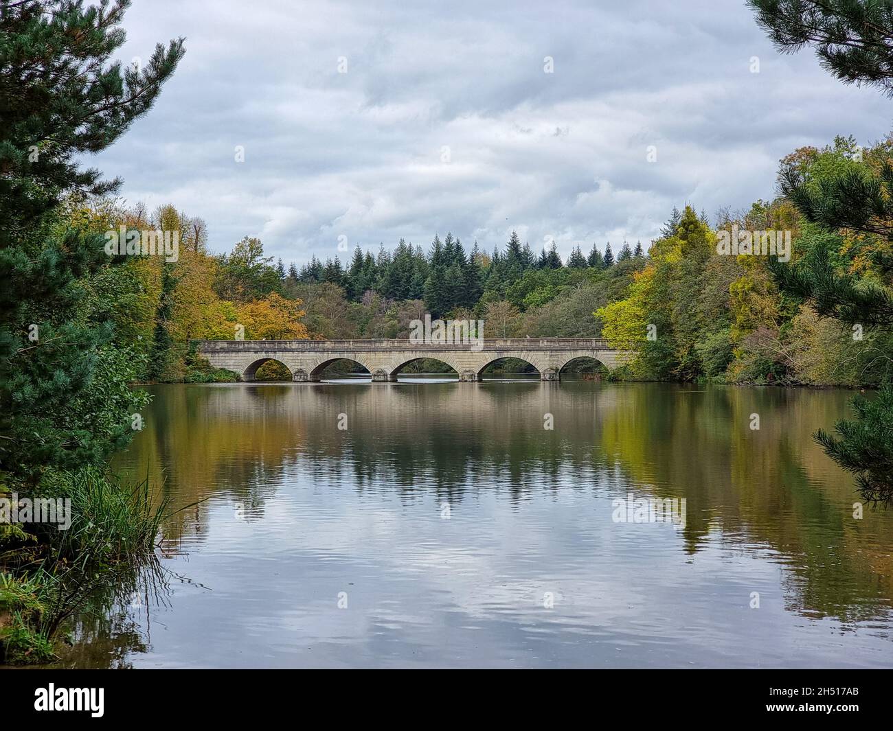 Bridge across Virginia Water Lake in Windsor Great Park, England Stock ...