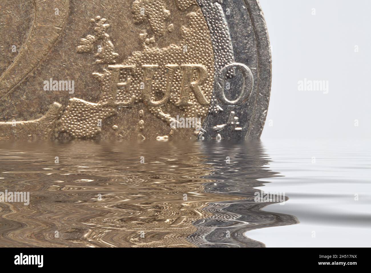 Detail of the map of Europe on a euro coin (macro) with the word euro ...