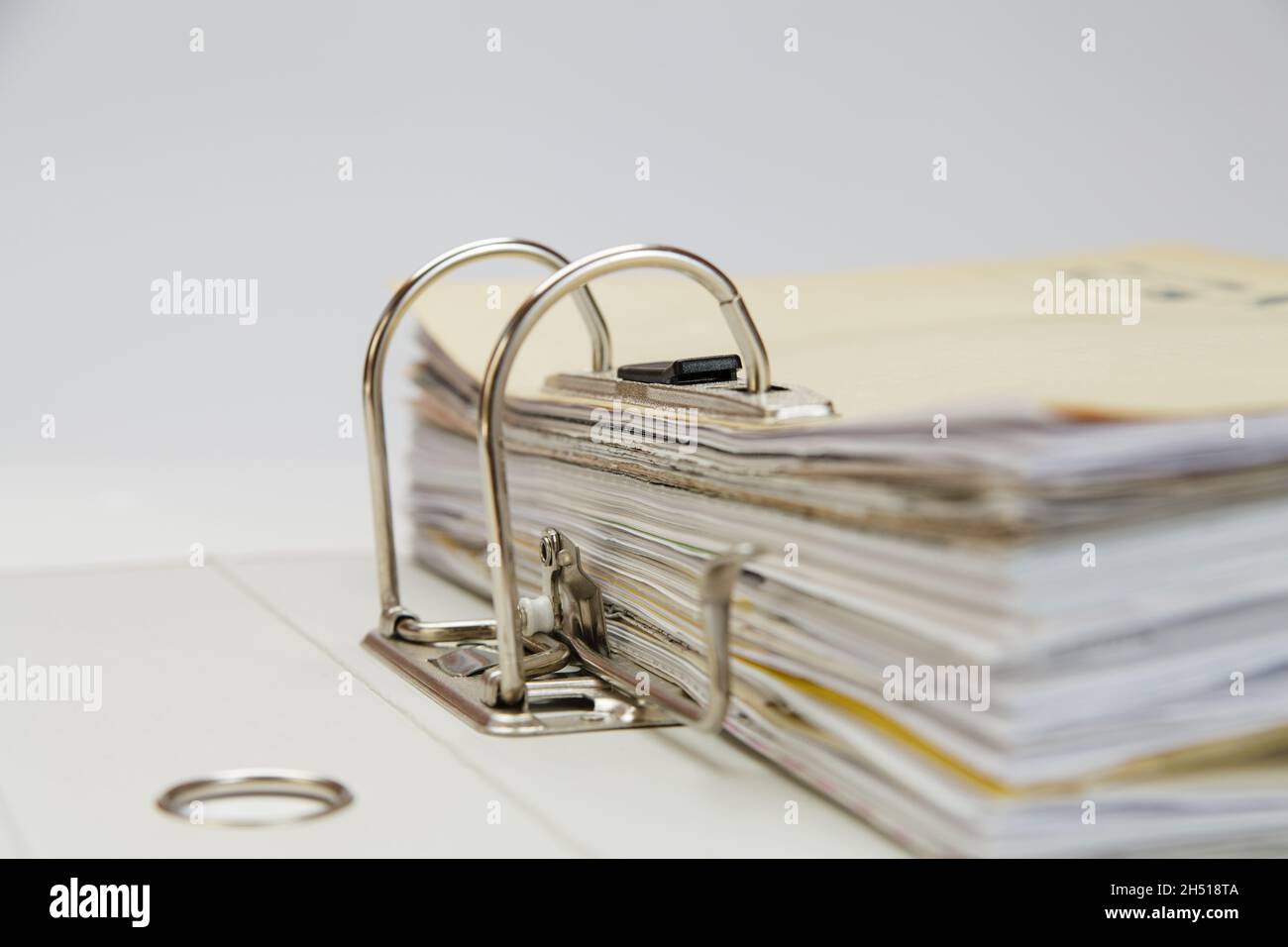 Wide folder with ring mechanism and full of documents Stock Photo - Alamy