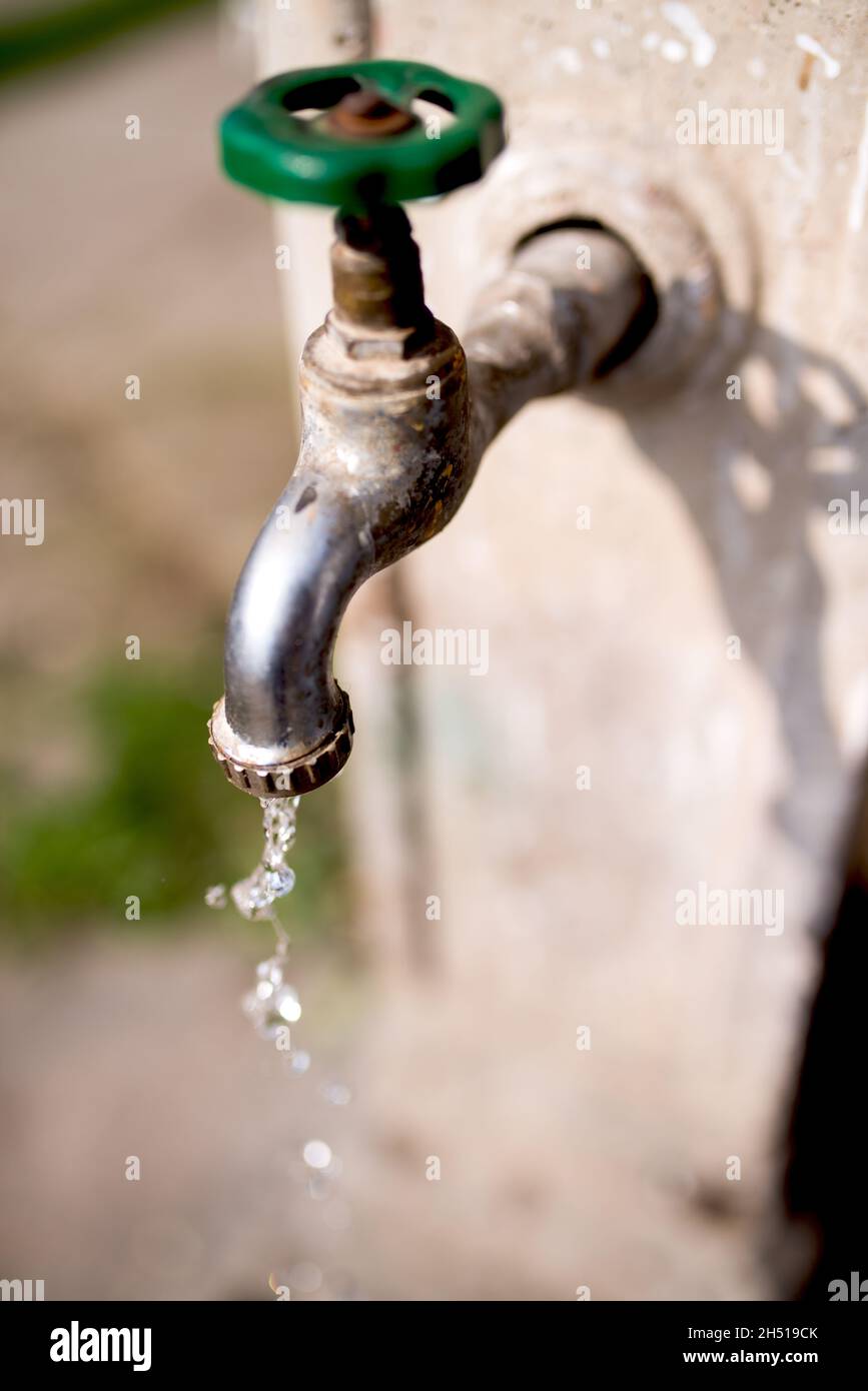 Water pipe flowing water Stock Photo - Alamy