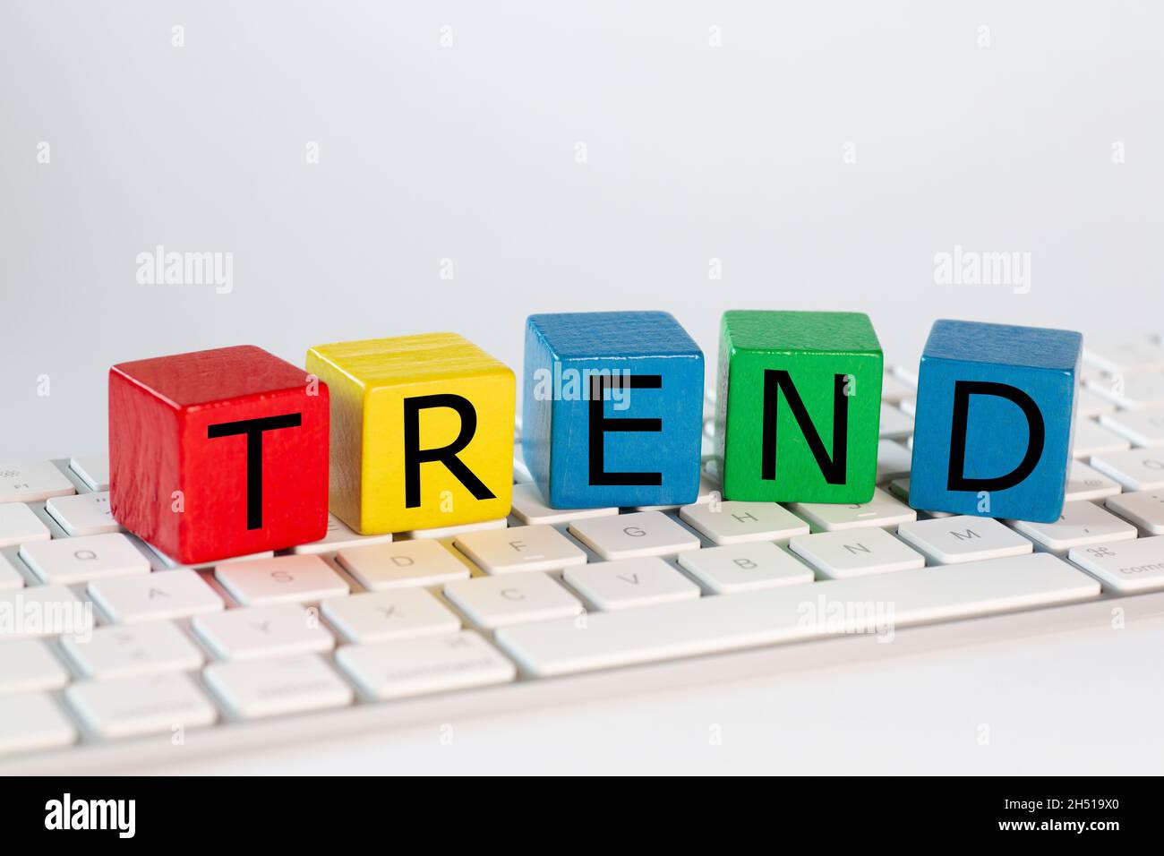 The letters TREND stand for blocks. These letters are written in black ...