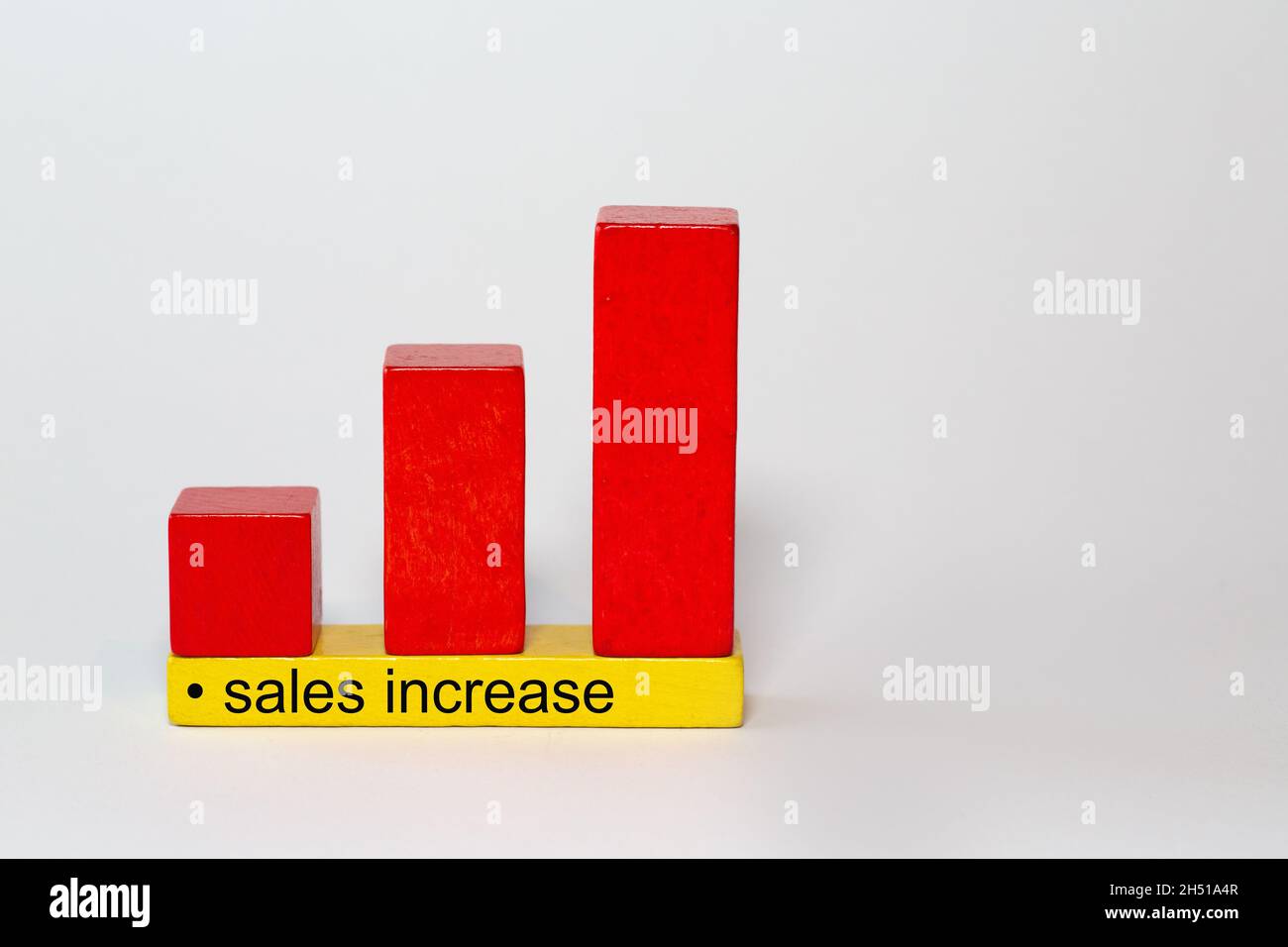 sales inreased is written on children's building blocks and represents ...