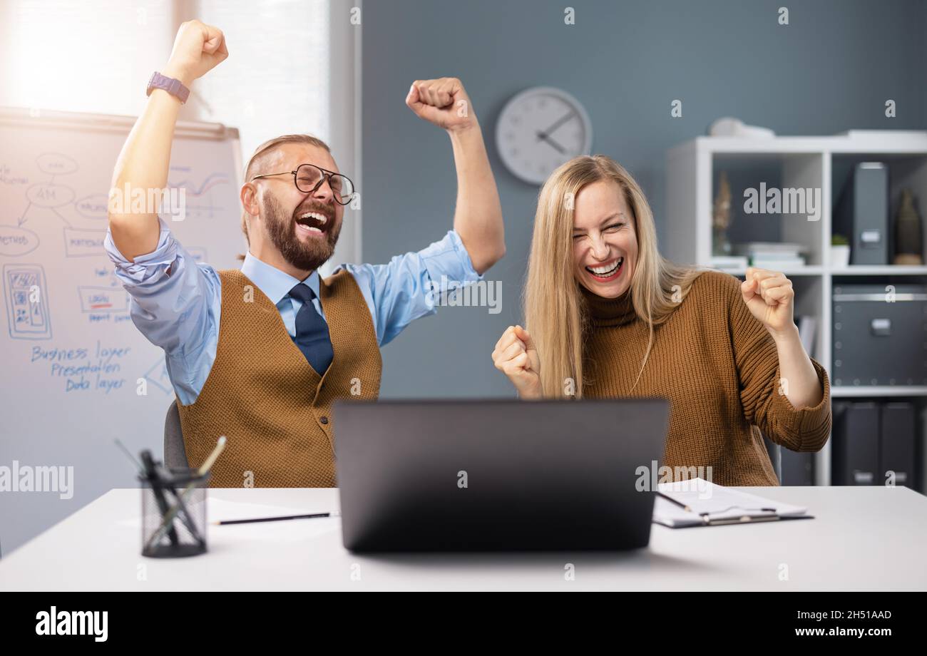 Happy business partners hi-res stock photography and images - Alamy