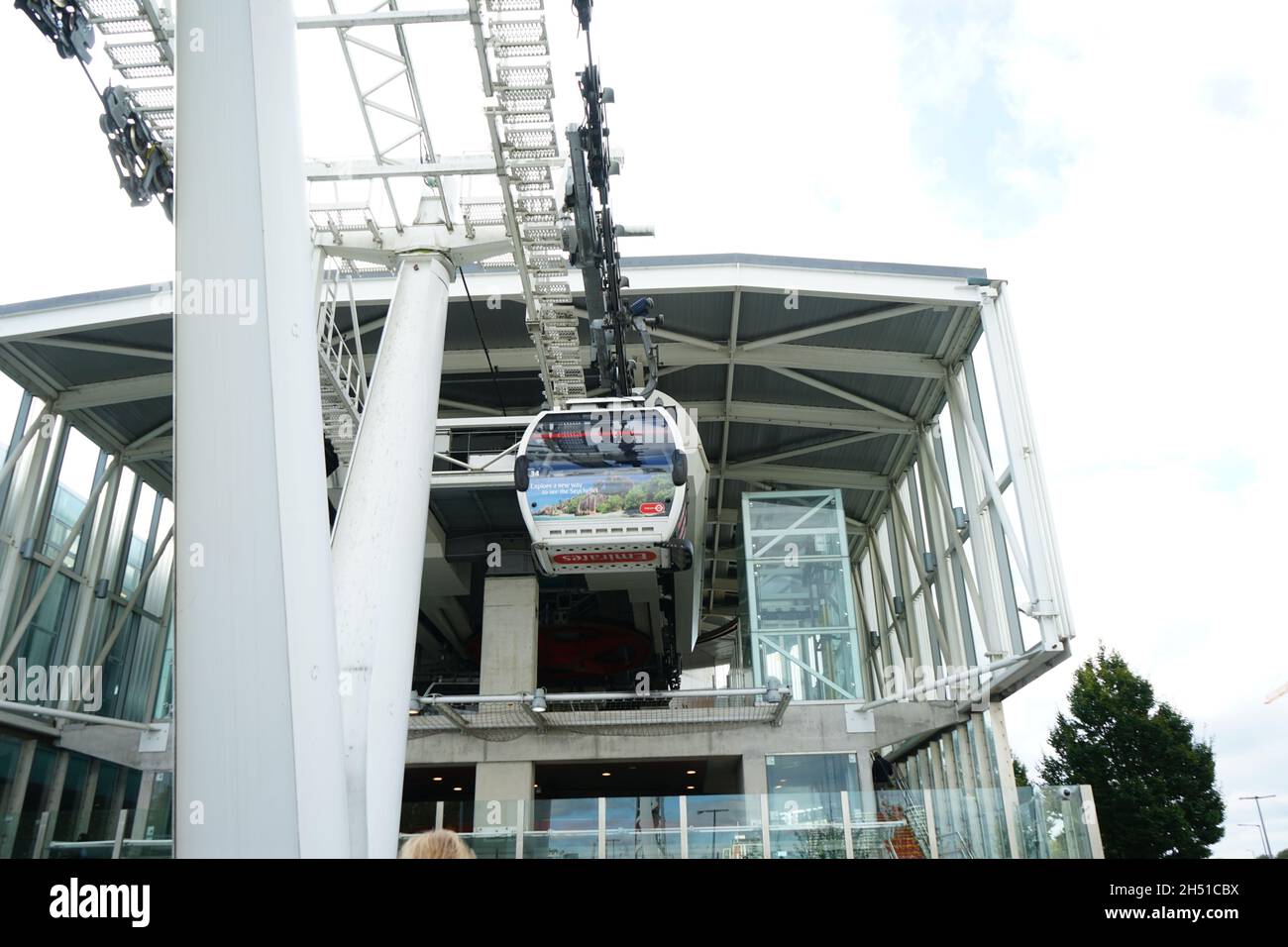 An Emirates cable car leaving the boarding point at the Greenwich ...