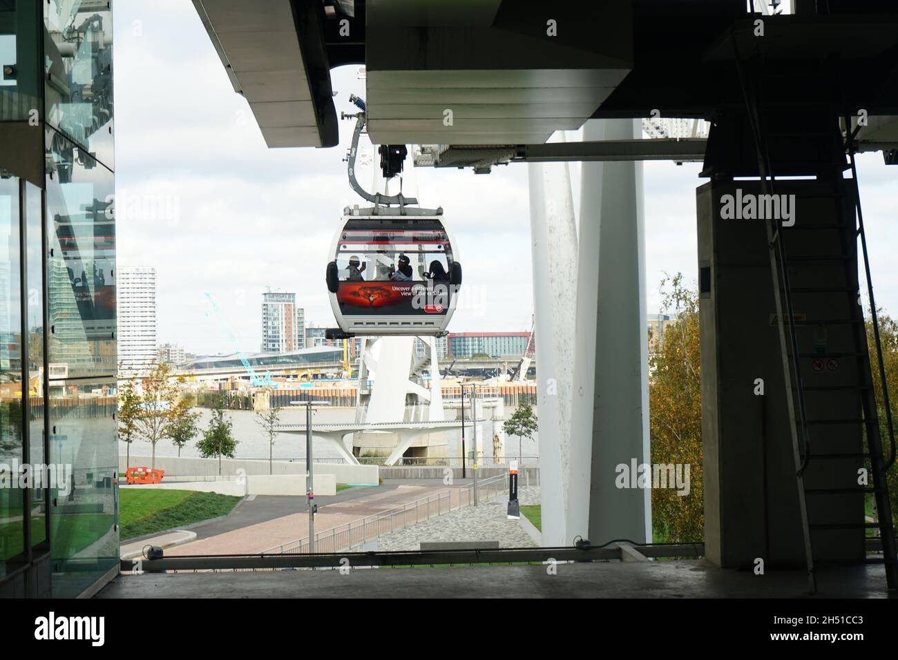 An Emirates cable car leaving the boarding point at the Greenwich ...