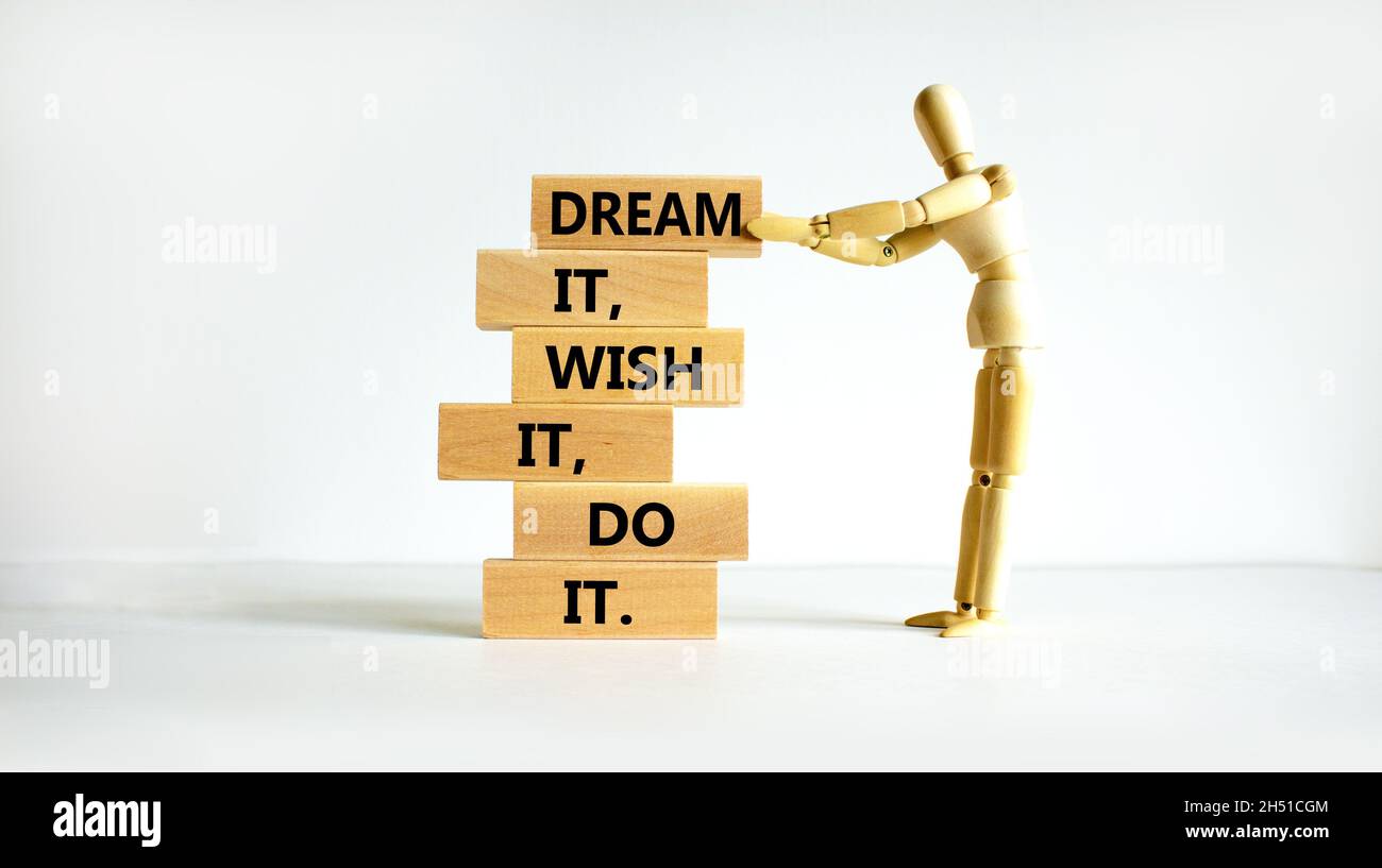 Dream wish and do it symbol. Wooden blocks with words Dream it, wish it ...