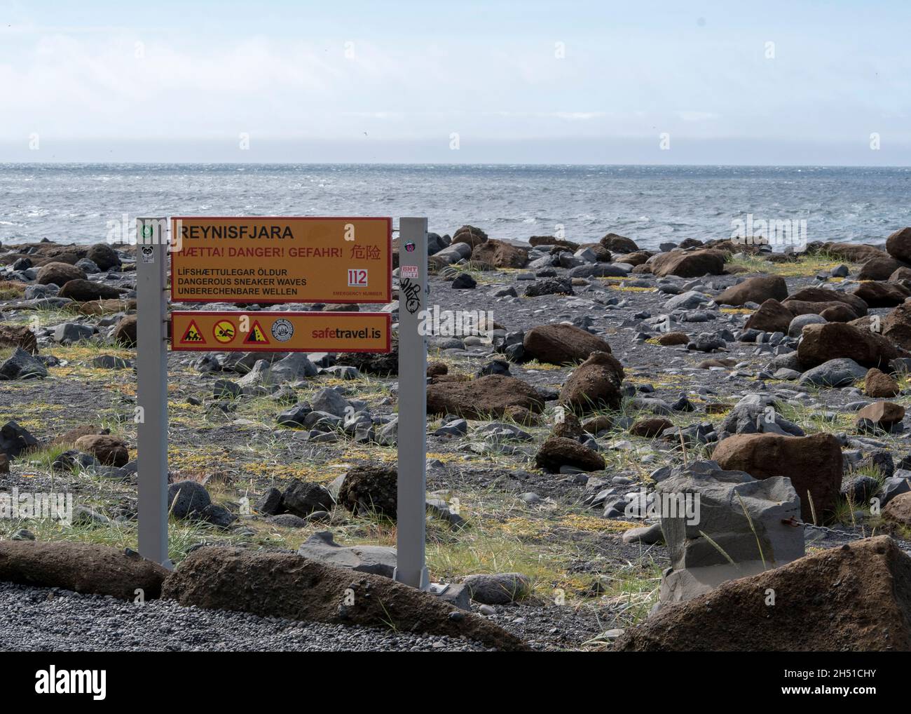 Landscape of entrance warning sign at Reynisfjara Black sand Beach Vik ...