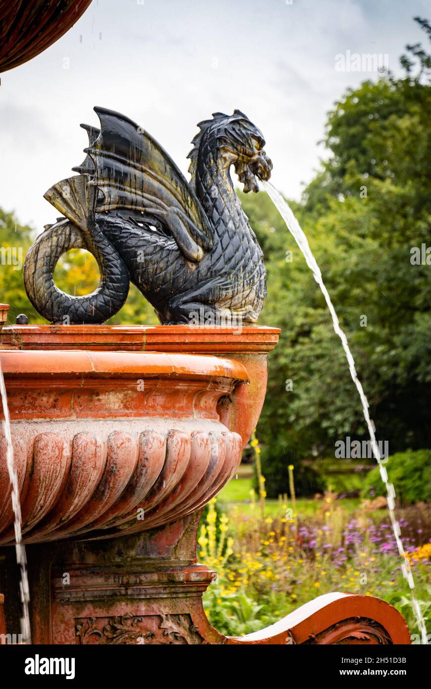 Hammersley terracotta dragon fountain with water spout in rain in ...