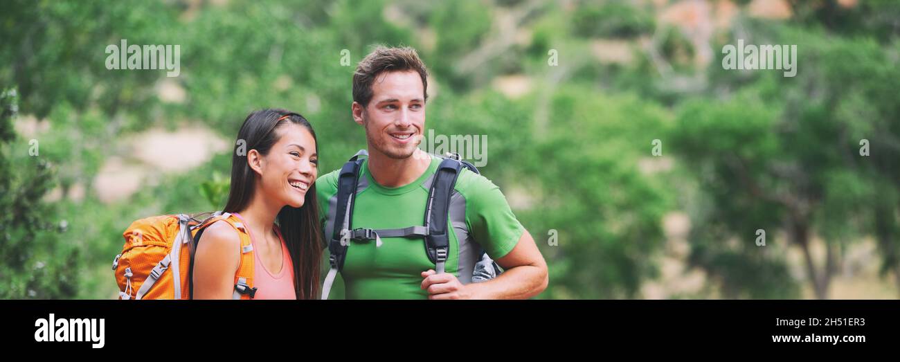 Happy hikers hiking in forest outdoor active lifestyle people panorama ...