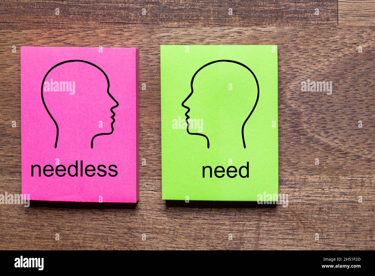 needless and contradicted need is written on purple and green notes ...