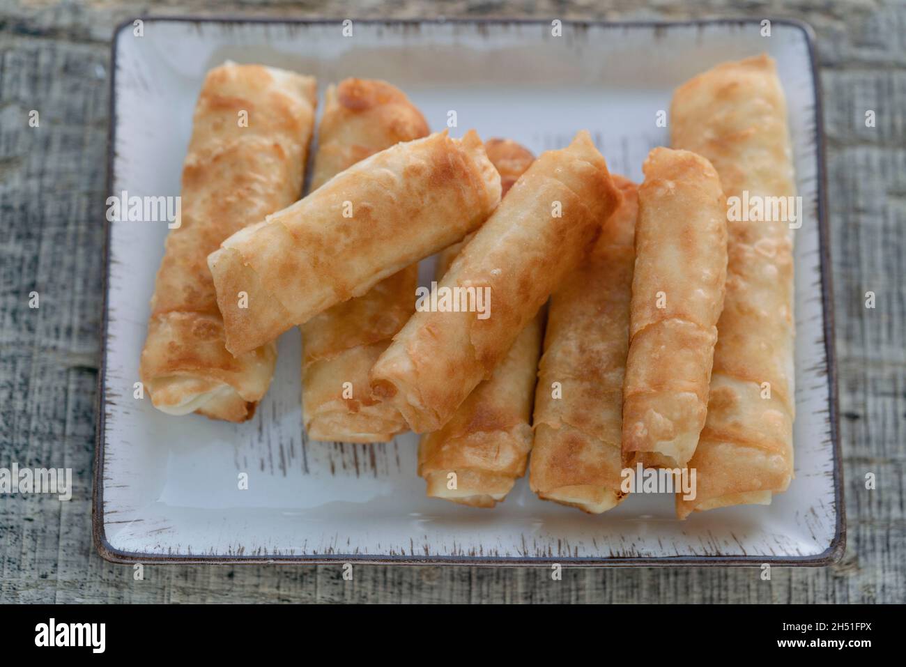closeup fried spring rolls made by phyllo dough on the table ...